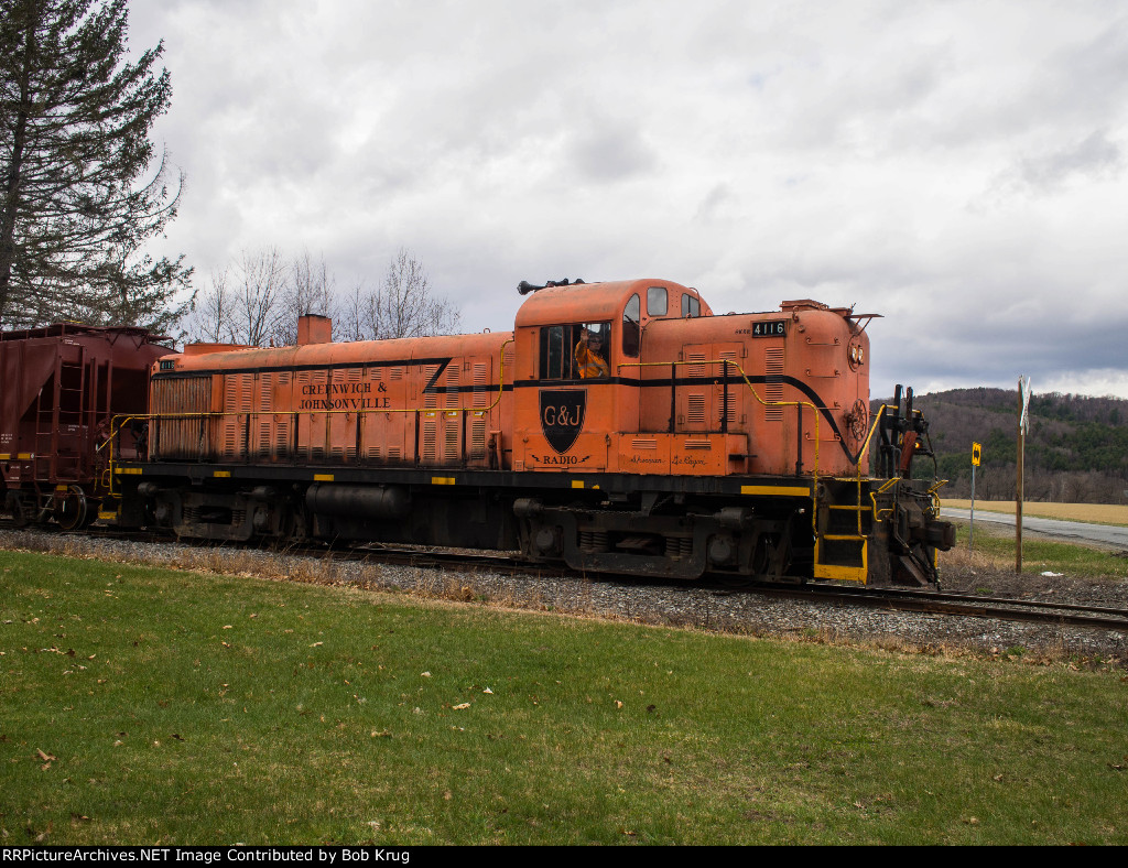 A friendly wave from the engineer at Fish Hatchery Rd grade crossing